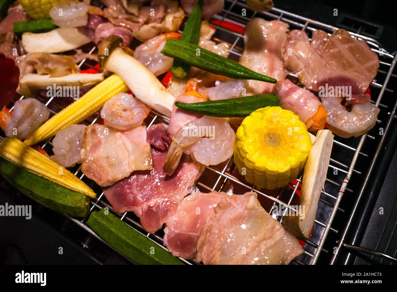 Process of cooking barbecue raw beef on grill Stock Photo - Alamy