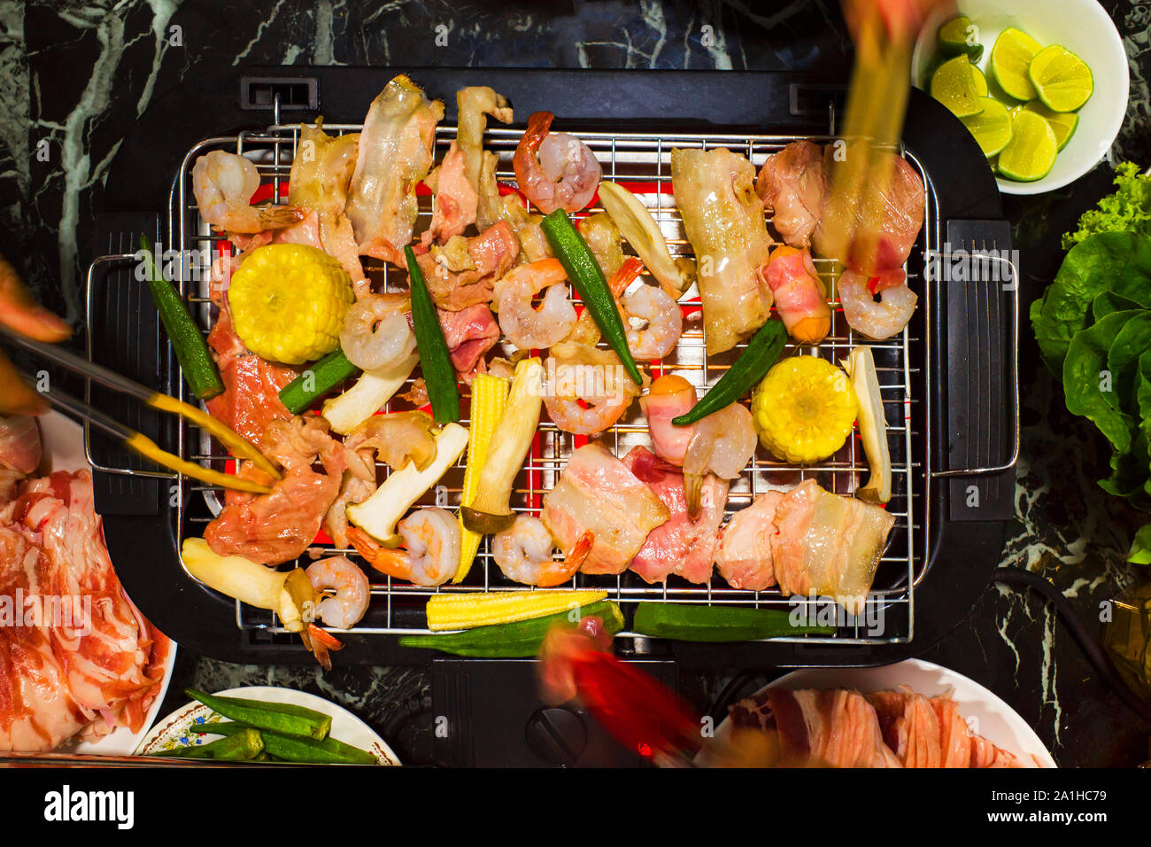 Process of cooking barbecue raw beef on grill Stock Photo - Alamy