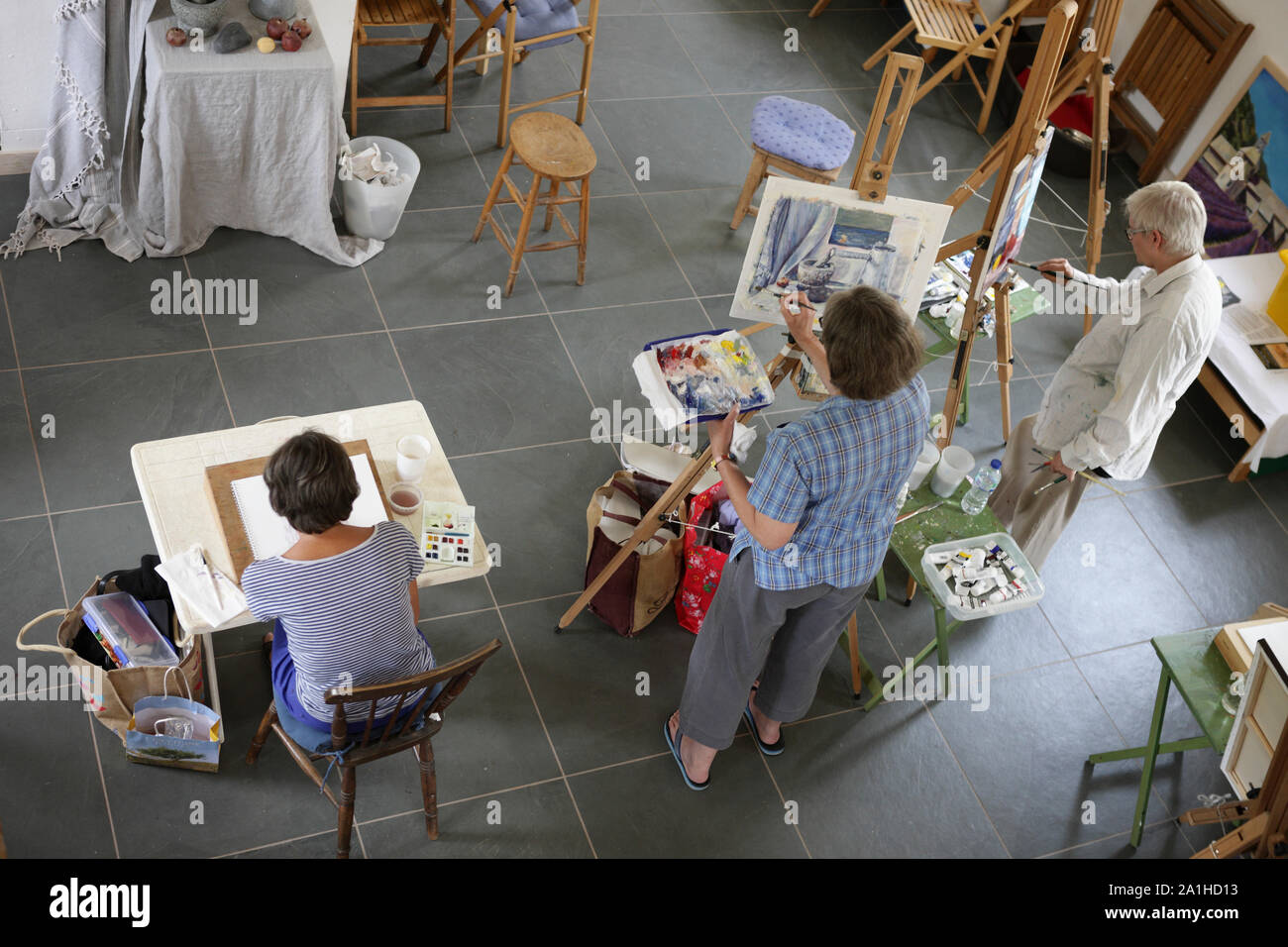 Mature students in a small group painting class at Wye Valley Arts ...