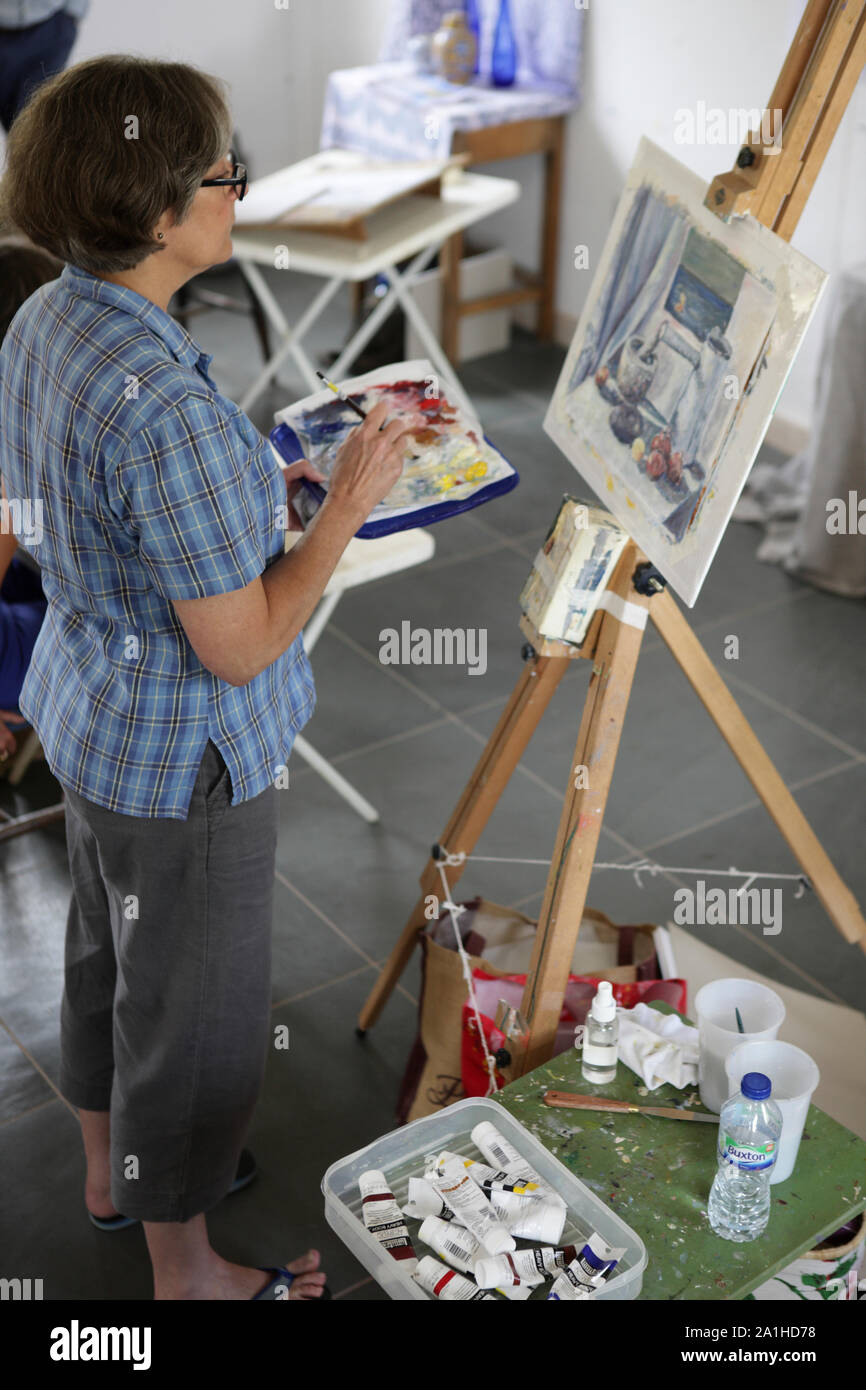 Mature students in a small group painting class at Wye Valley Arts ...