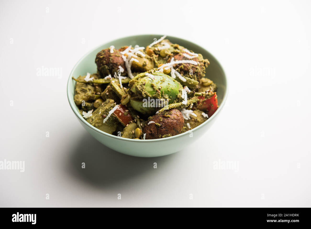 Undhiyu is a Gujarati mixed vegetable dish, specialty of Surat, India ...