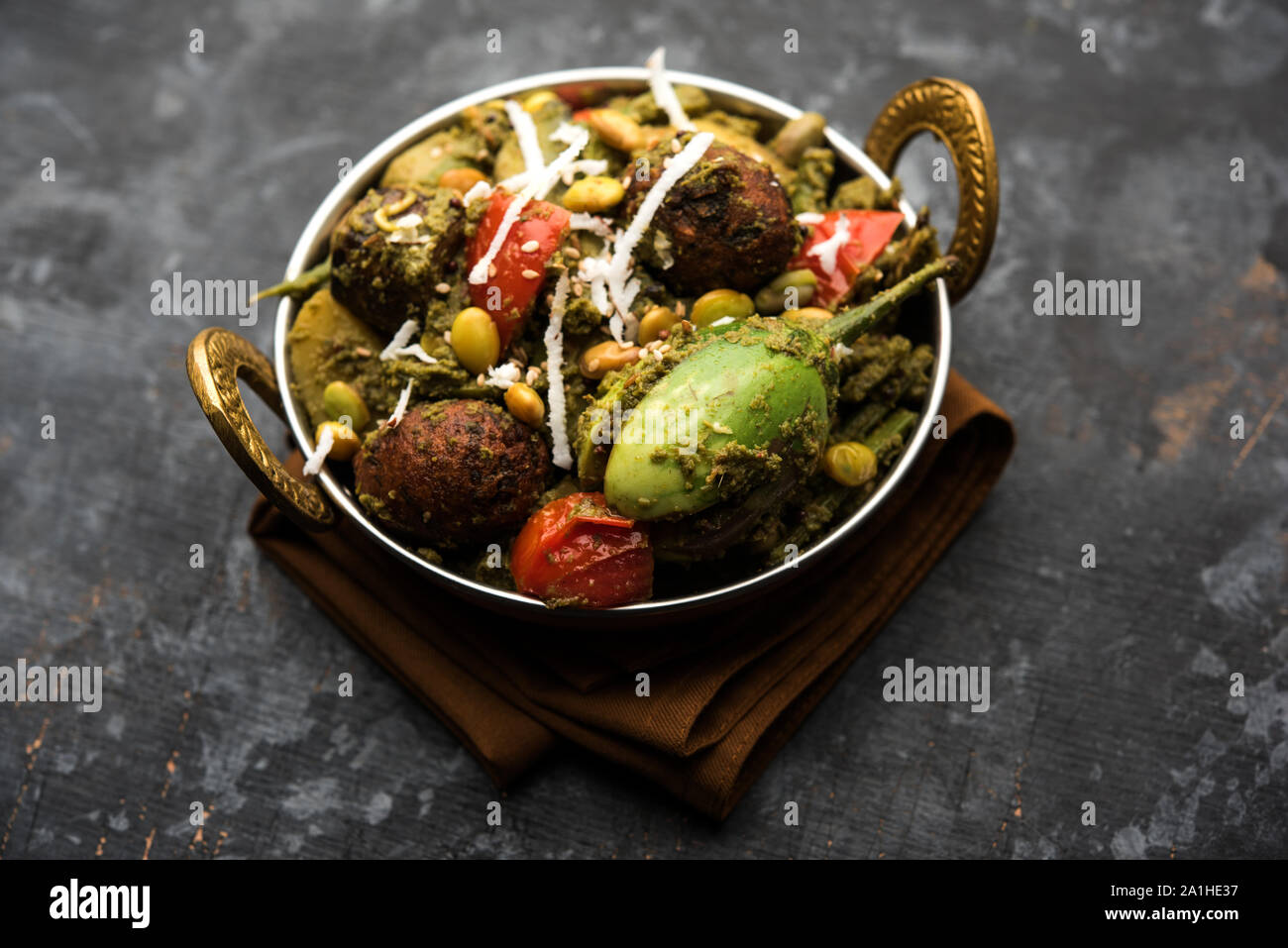 Undhiyu is a Gujarati mixed vegetable dish, specialty of Surat, India ...