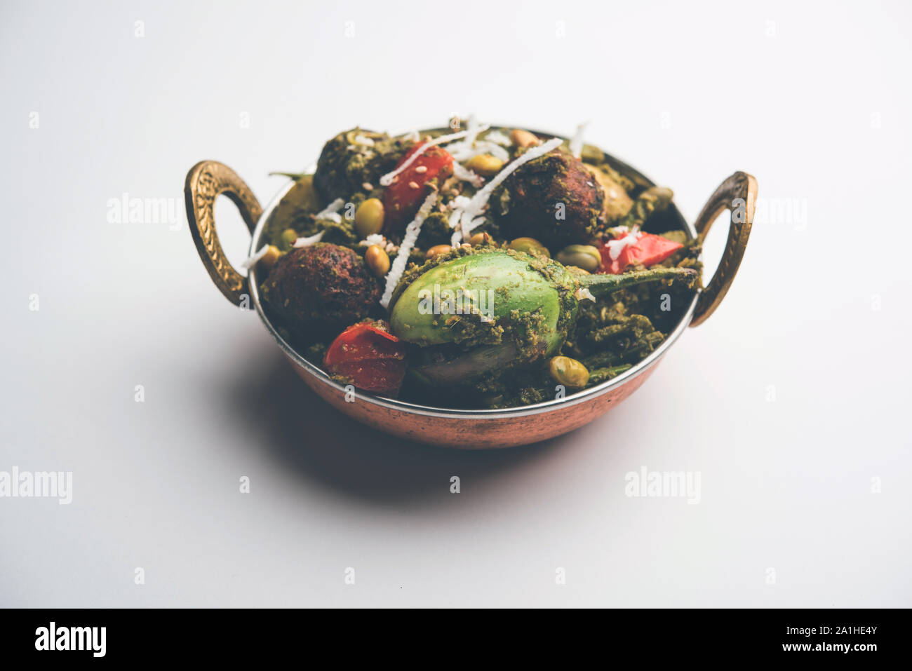 Undhiyu is a Gujarati mixed vegetable dish, specialty of Surat, India ...