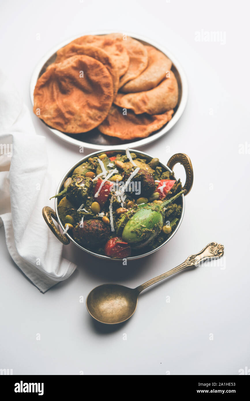 Undhiyu is a Gujarati mixed vegetable dish, specialty of Surat, India ...