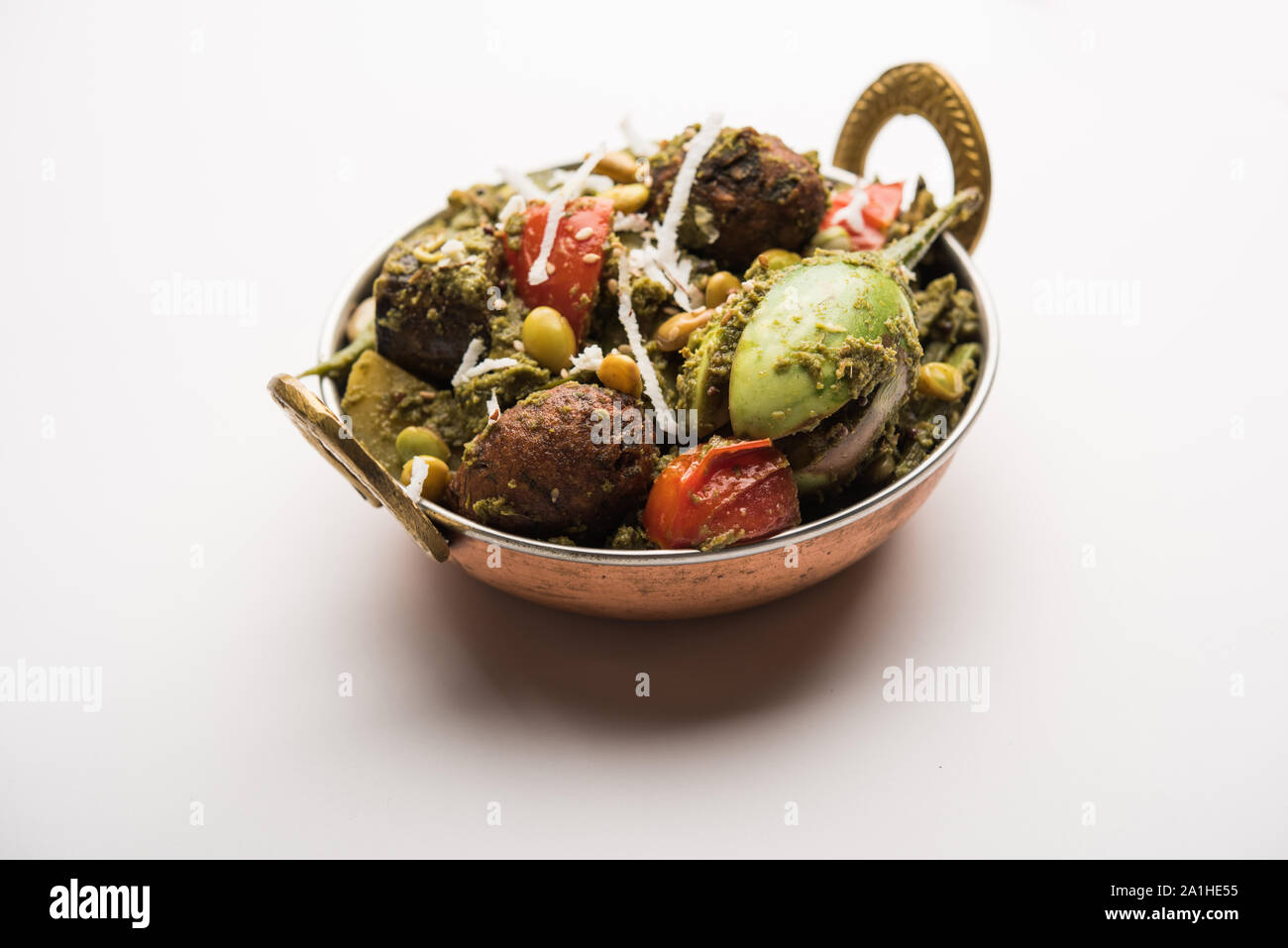 Undhiyu is a Gujarati mixed vegetable dish, specialty of Surat, India ...