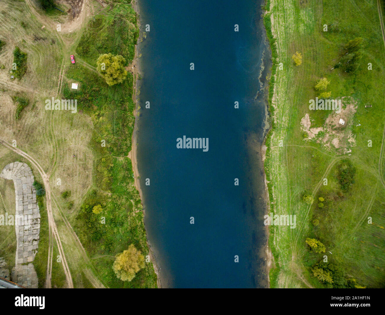 Landscape nature View from above on the green grass and the blue river ...