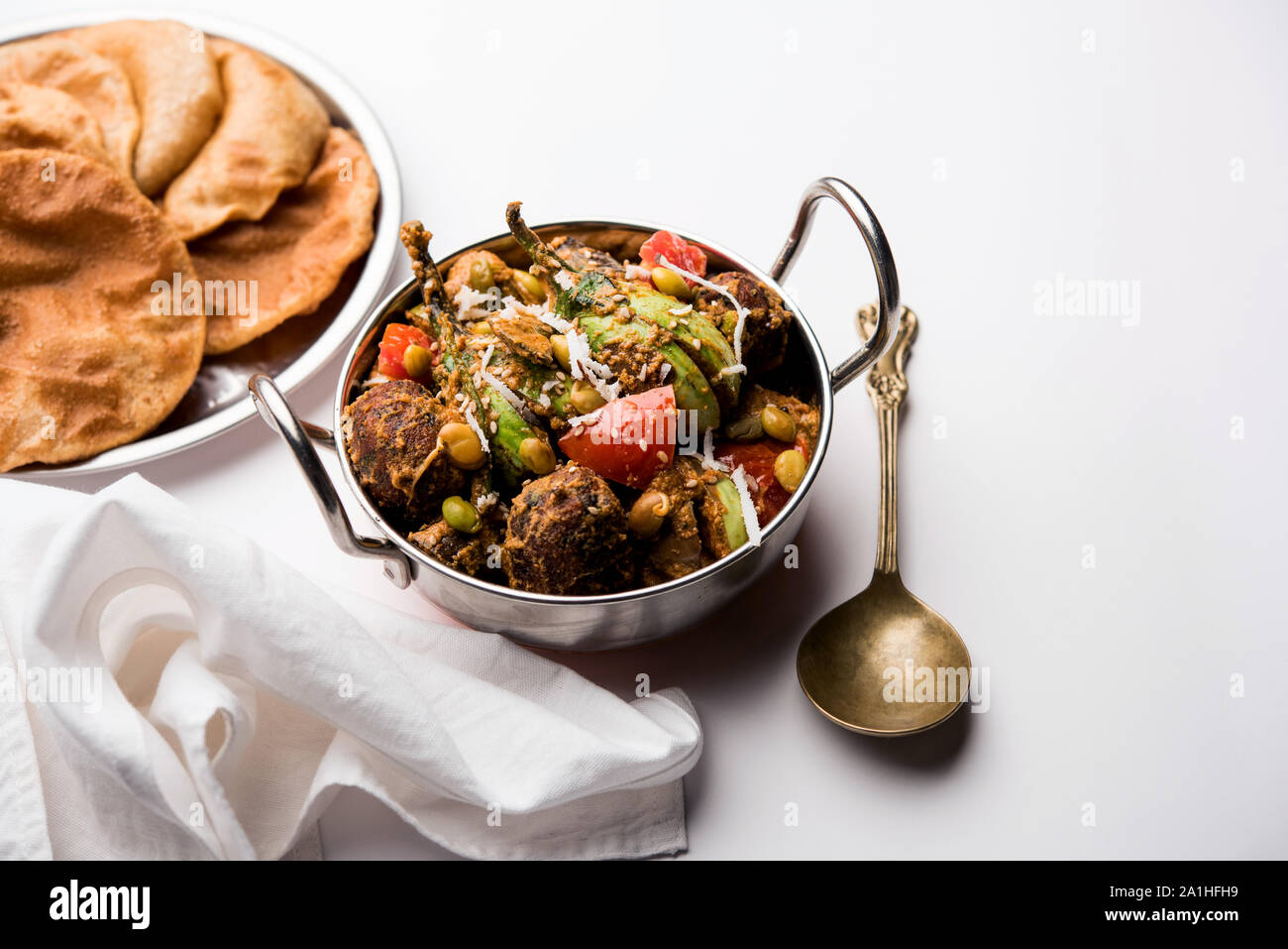 Undhiyu is a Gujarati mixed vegetable dish, specialty of Surat, India ...