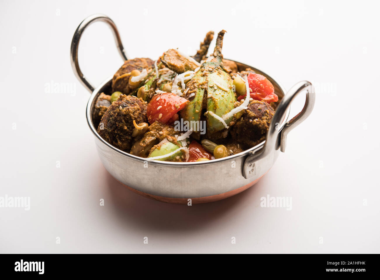 Undhiyu is a Gujarati mixed vegetable dish, specialty of Surat, India ...