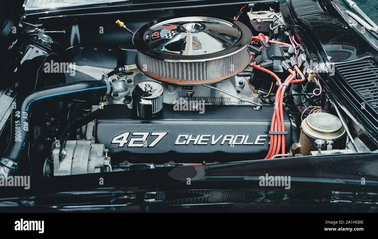 Shiny Engine in vintage Chevrolet car Stock Photo - Alamy