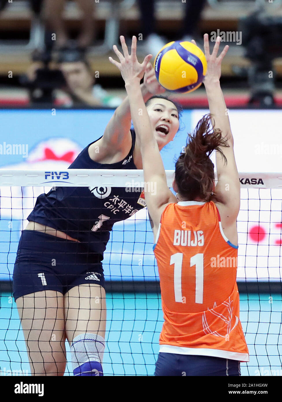 Osaka, Japan. 27th Sep, 2019. Yuan Xinyue (L) of China spikes the balll during the Round Robin ...