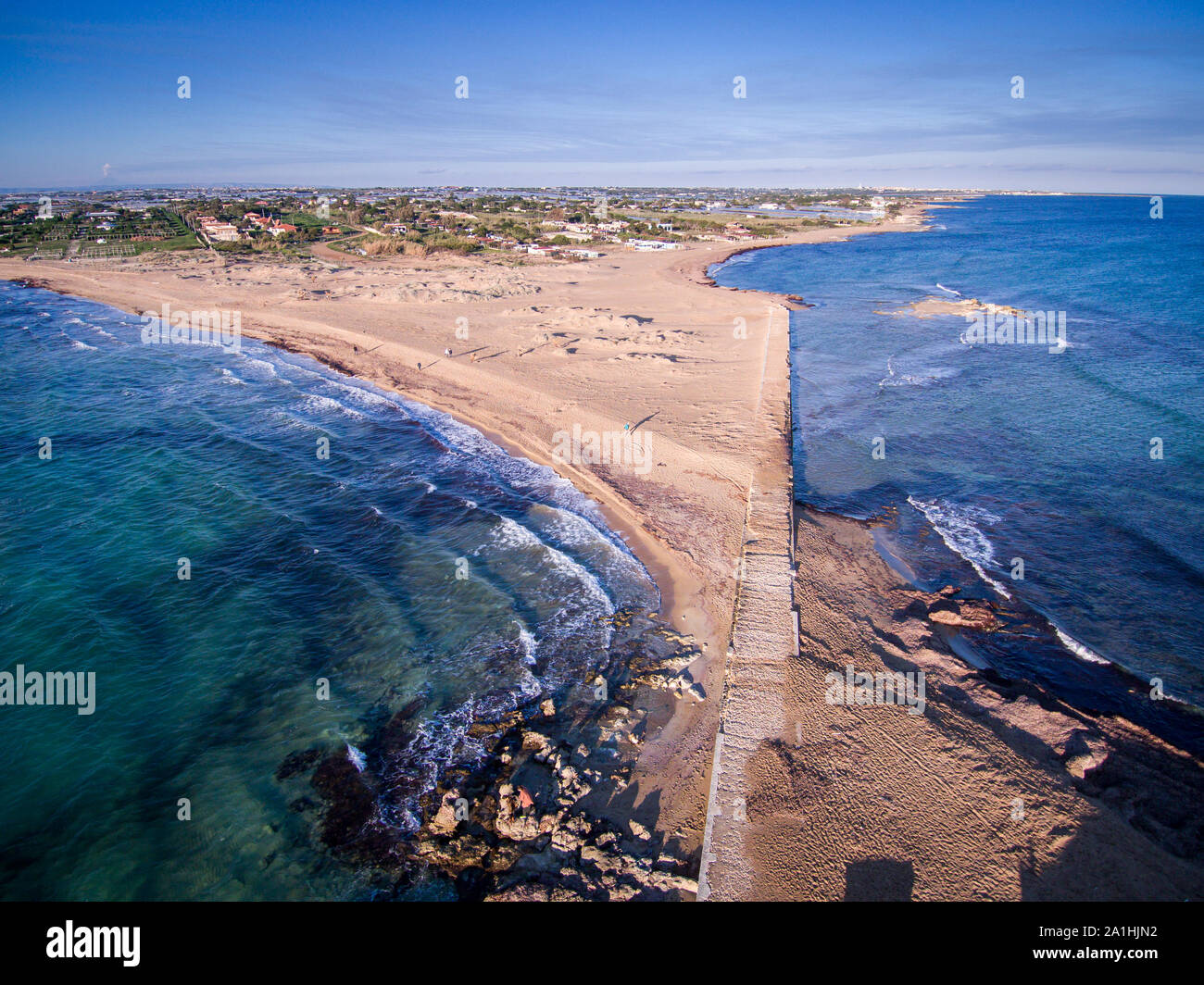 Aerial view at sunset of the beach of the Isola delle Correnti, near ...