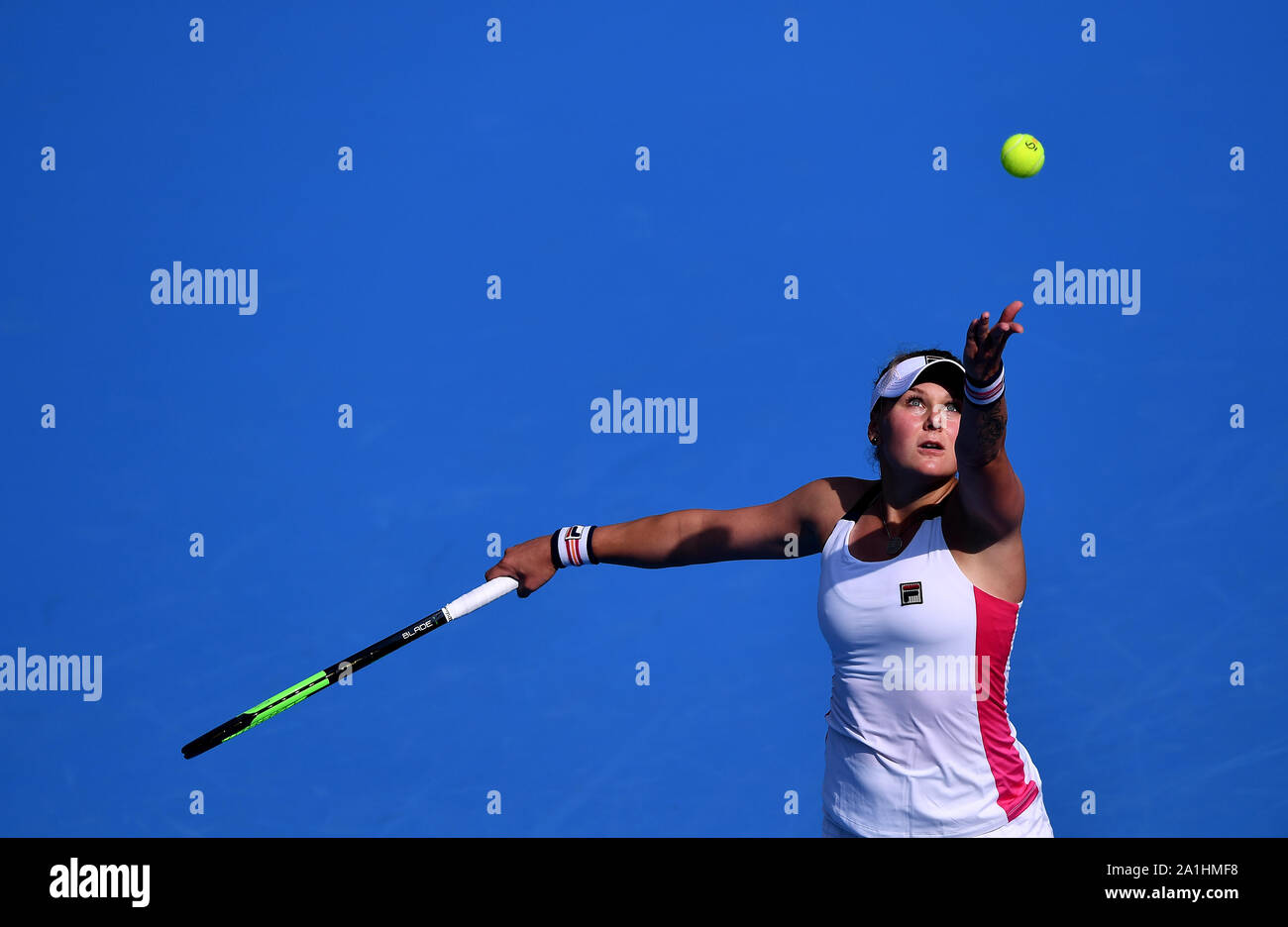 Beijing, China. 27th Sep, 2019. Kateryna Kozlova serves during the ...