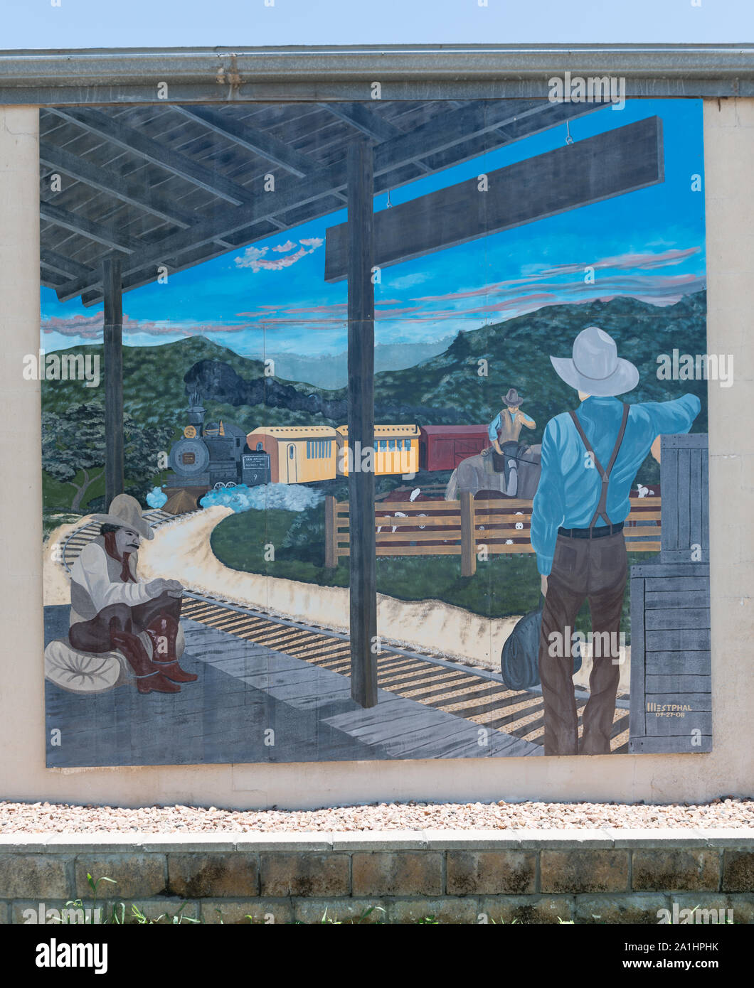 Mural describing the arrival of the railroad painted on the wall of a ...