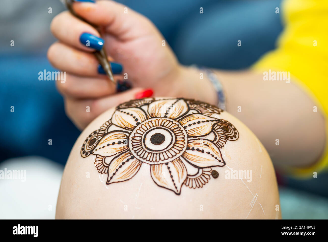 Drawing process of henna mehndi tattoo on womans bald head Stock Photo ...