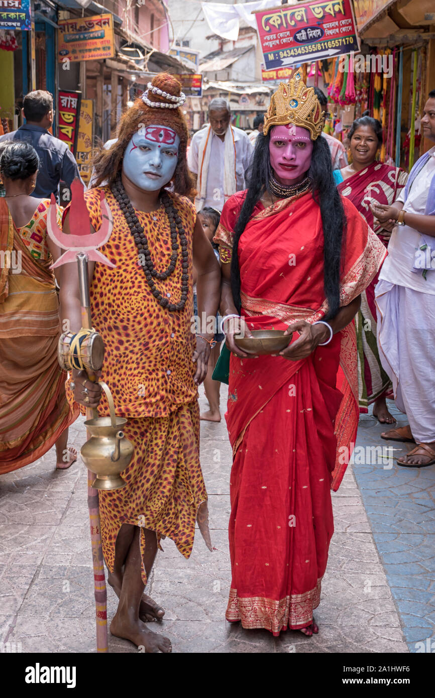 Indian man and Woman dressed as Indian Gods shiv Parvati at Baba ...