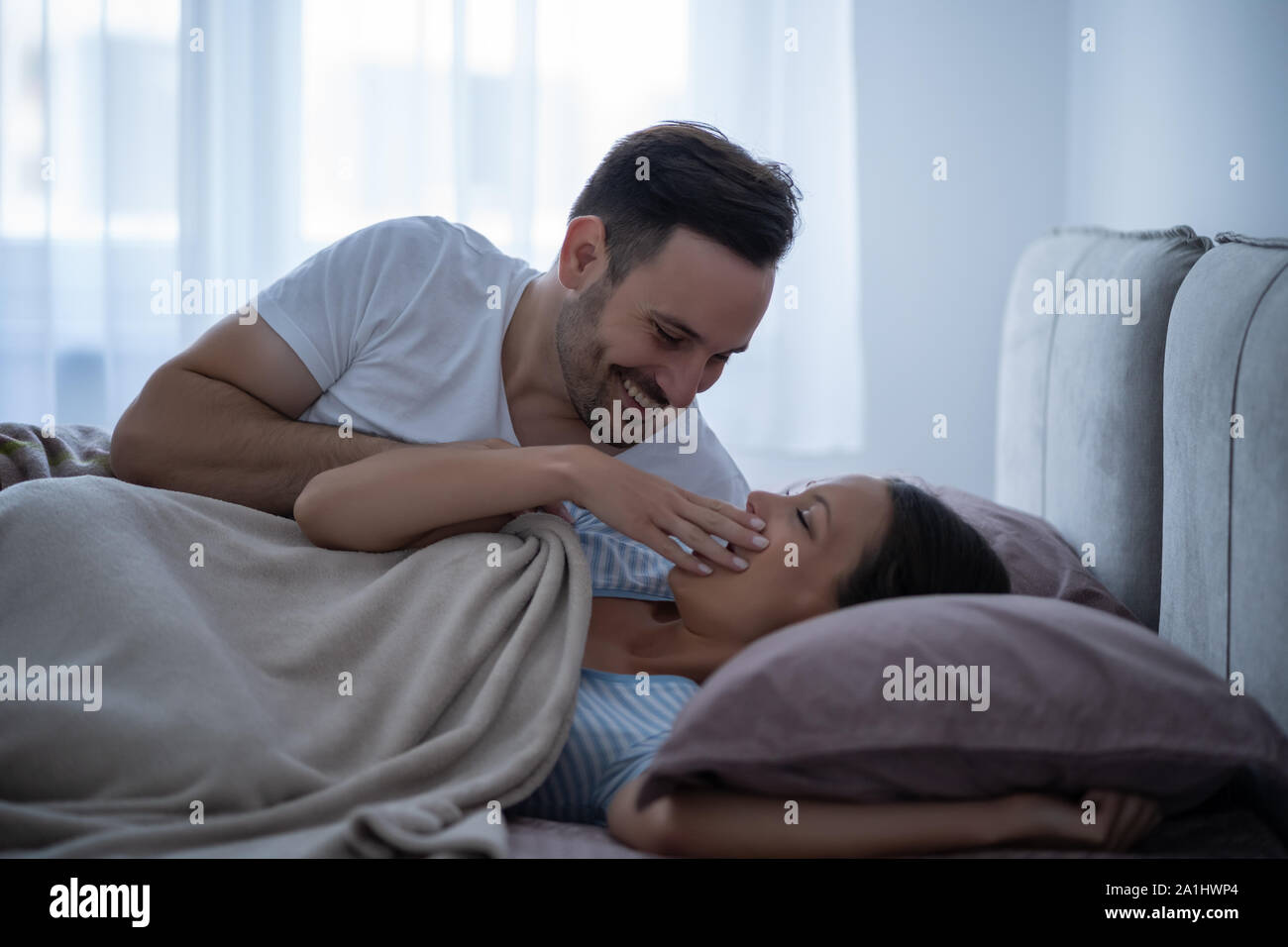 Husband wife bed hi-res stock photography and images - Alamy
