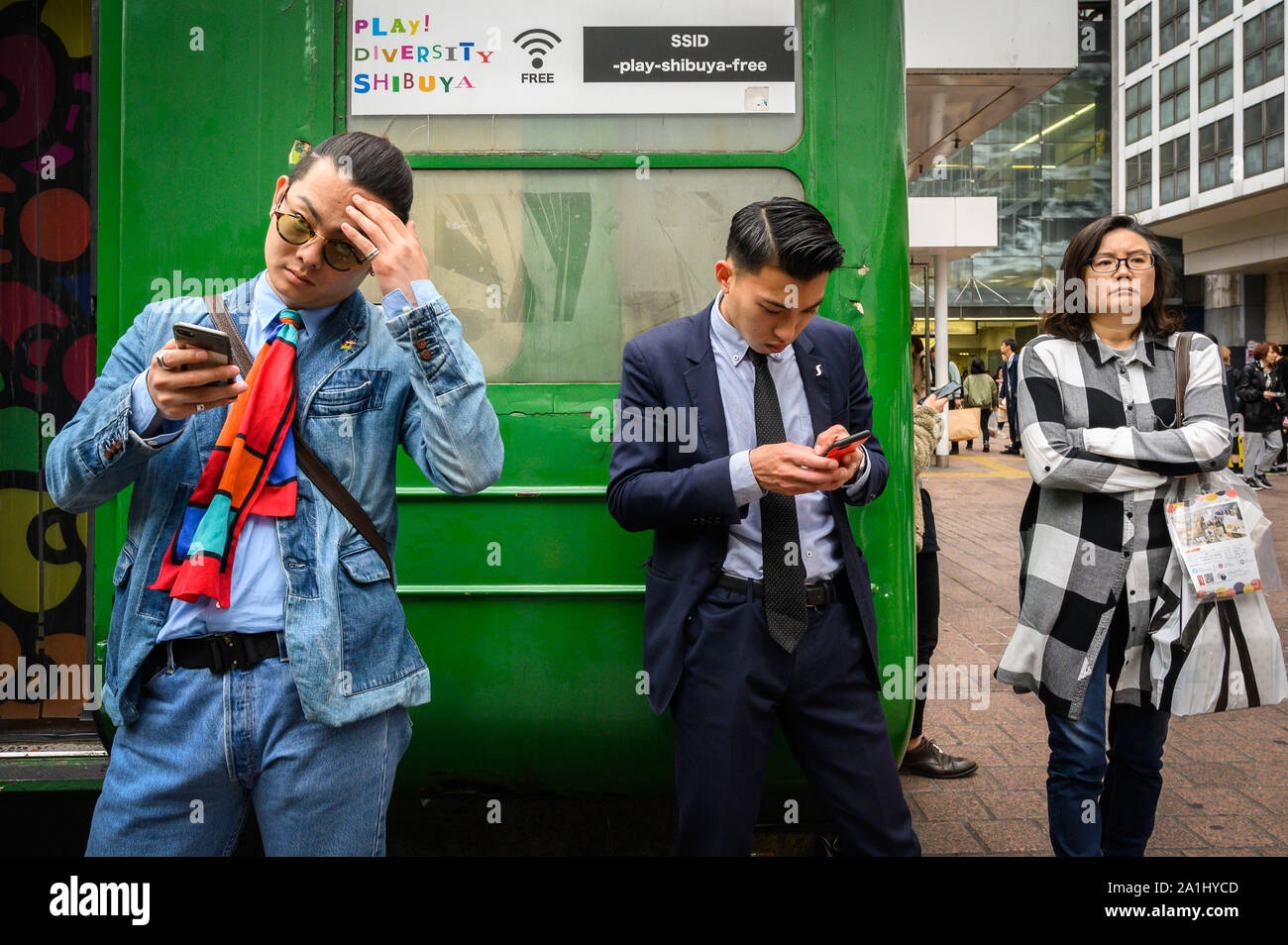 Using mobile phones japan hi-res stock photography and images - Alamy