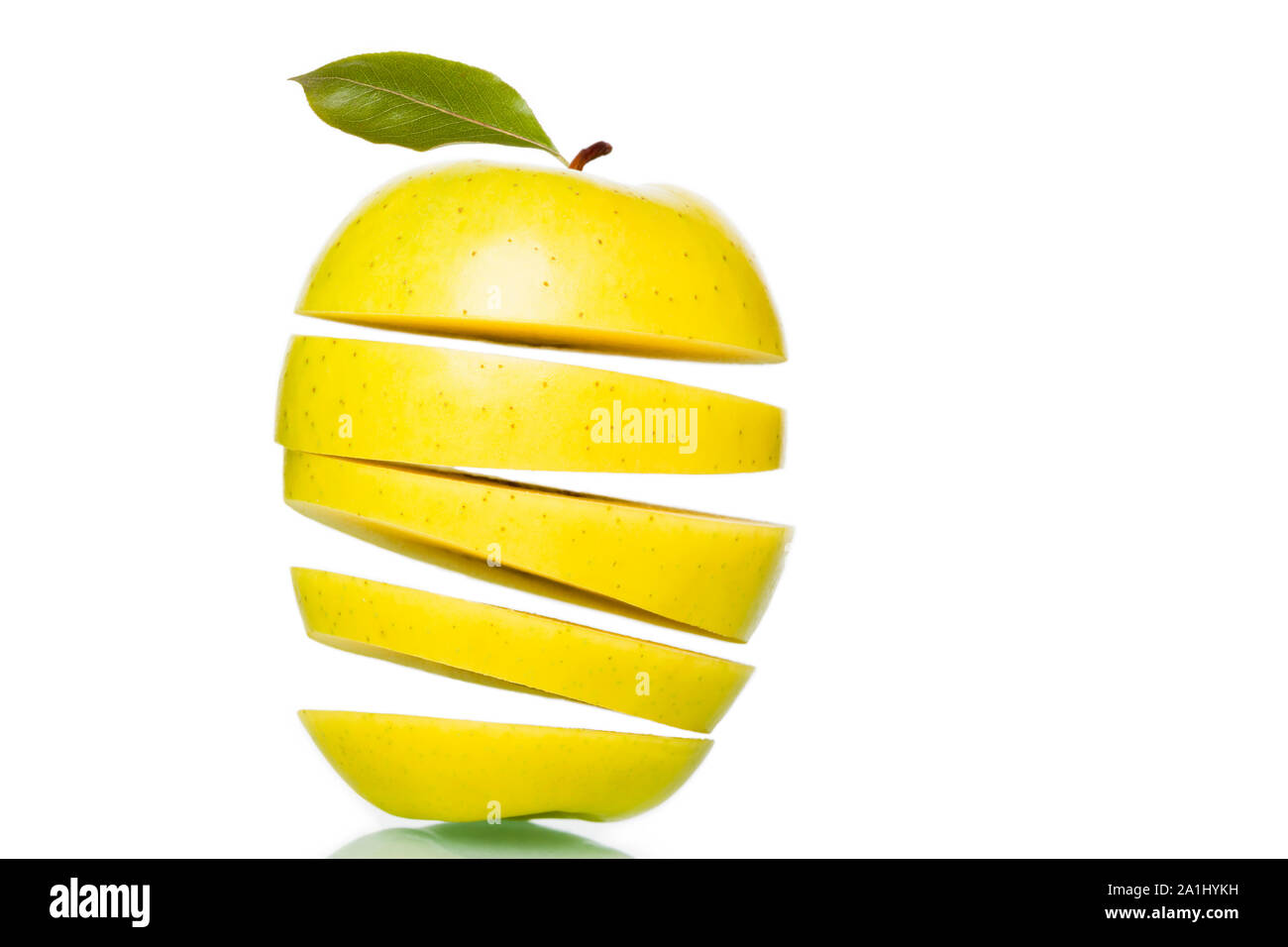 Green apple cut into slices Stock Photo - Alamy