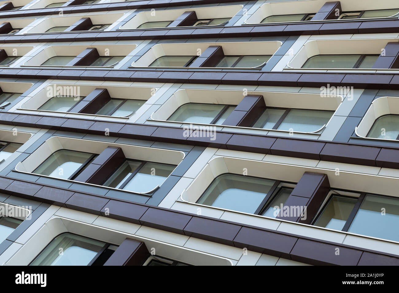soft square shaped windows on modern urban luxury designed apartment ...
