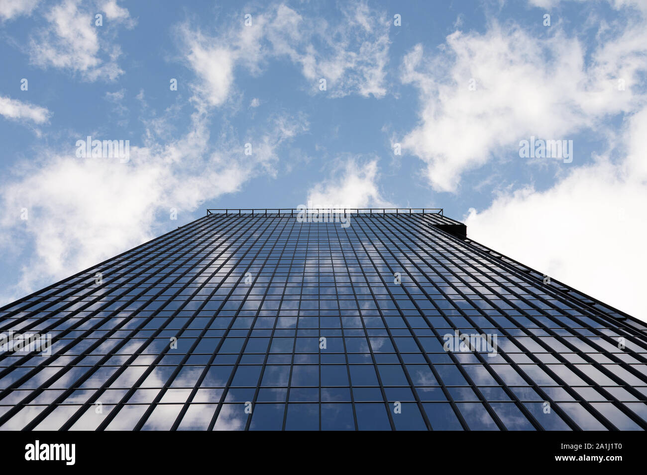 Bottom view of a modern glass skyscraper Stock Photo - Alamy