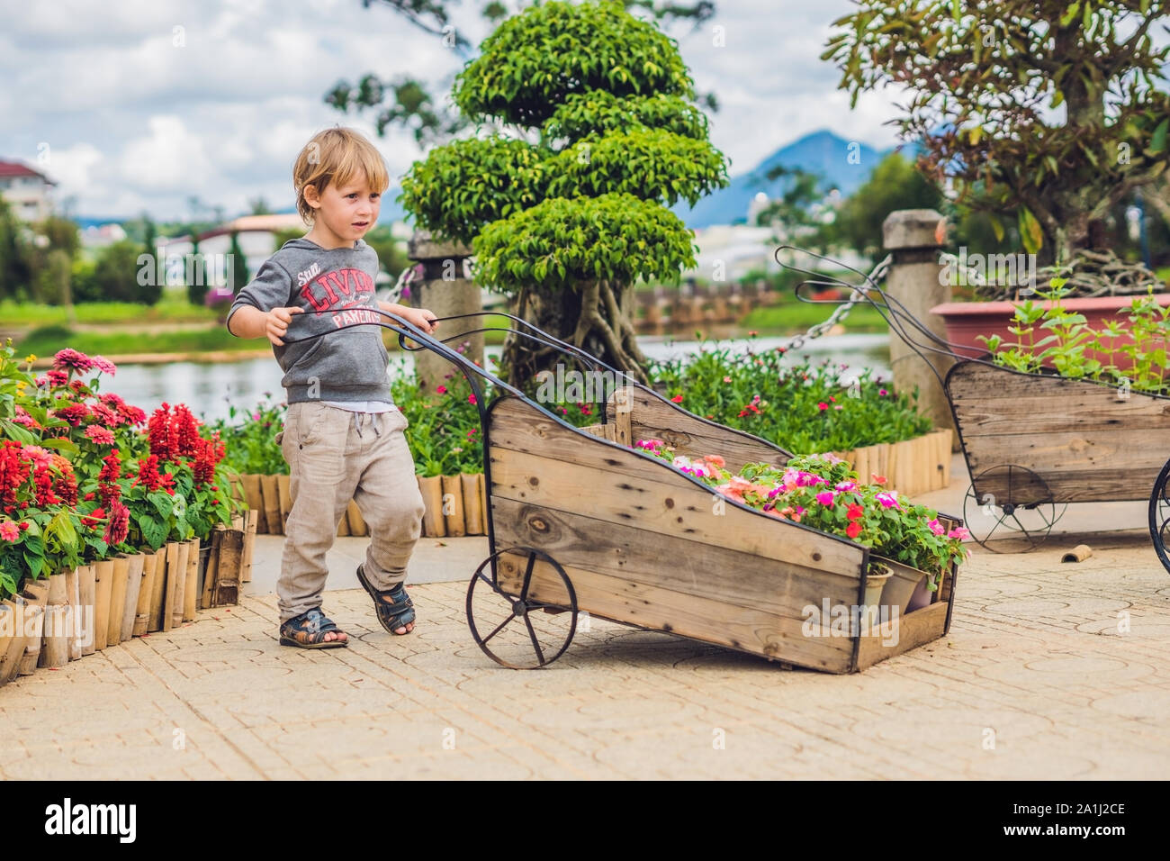 Boy dragging car hi-res stock photography and images - Alamy