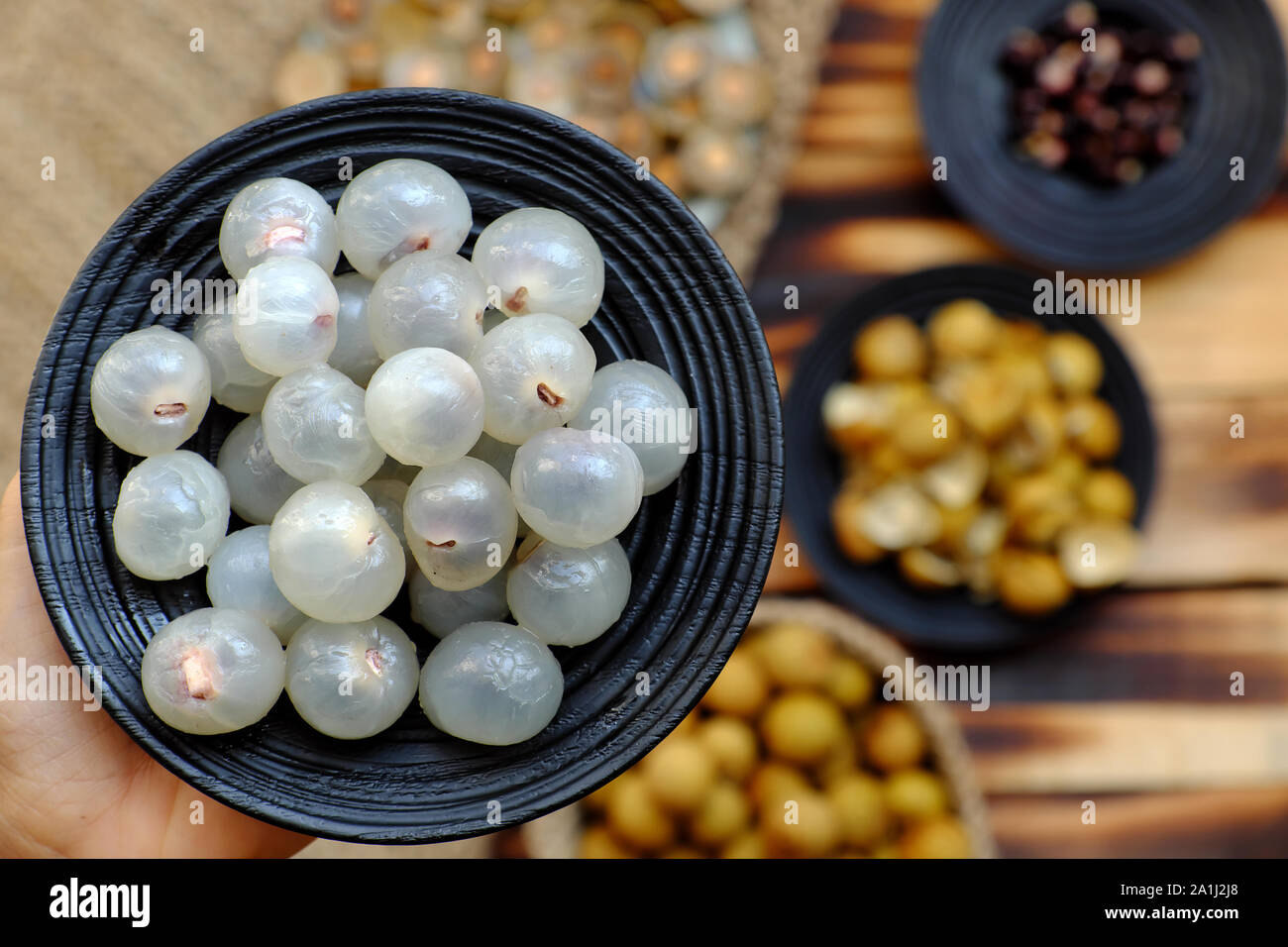 Top view Vietnamese tropical sweet, watery pulp fruit, close up Longan ...