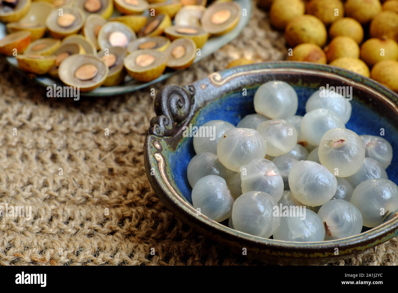 Top view Vietnamese tropical sweet, watery pulp fruit, close up Longan ...