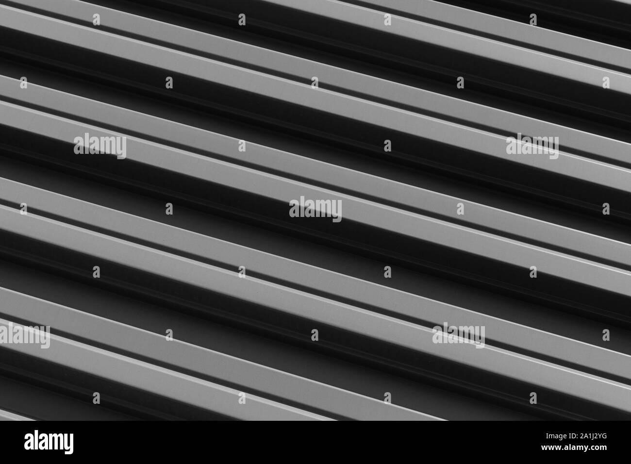 Front view of diagonal stripes on modern gray gate door or wall surface ...