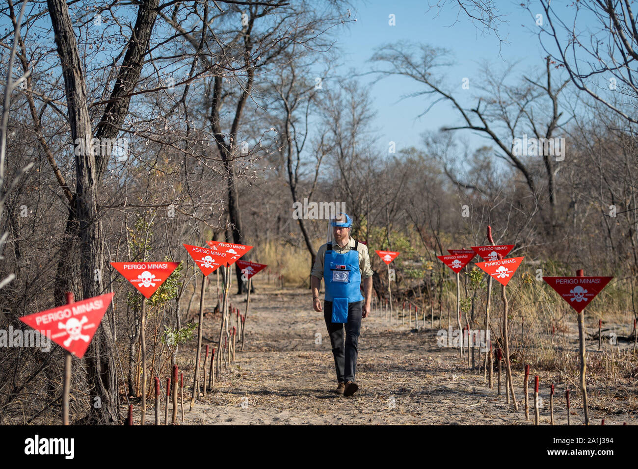The Duke of Sussex walks through a minefield in Dirico, Angola, during ...