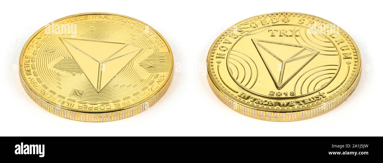 Face and back side of the crypto currency golden tron isolated on white ...