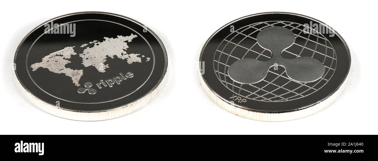 Face and back side of the crypto currency silver ripple isolated on ...