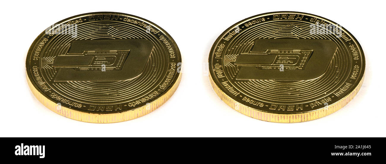 Face and back side of the crypto currency golden dash isolated on white ...