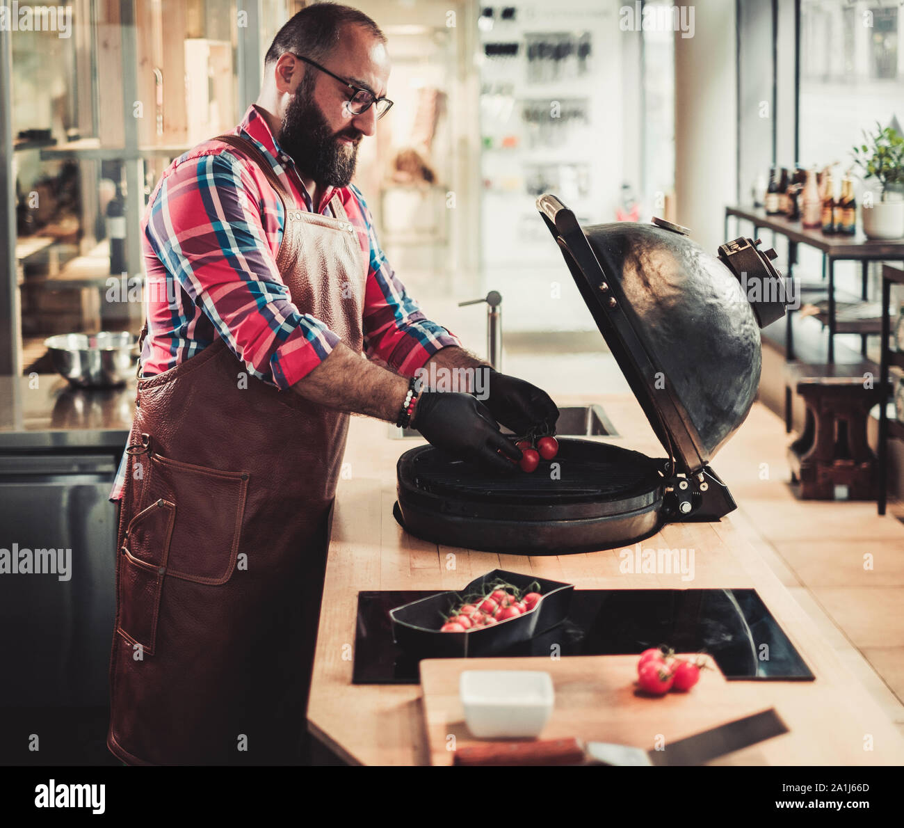 Chef preparing grilled vegetables in a restaurant Stock Photo - Alamy
