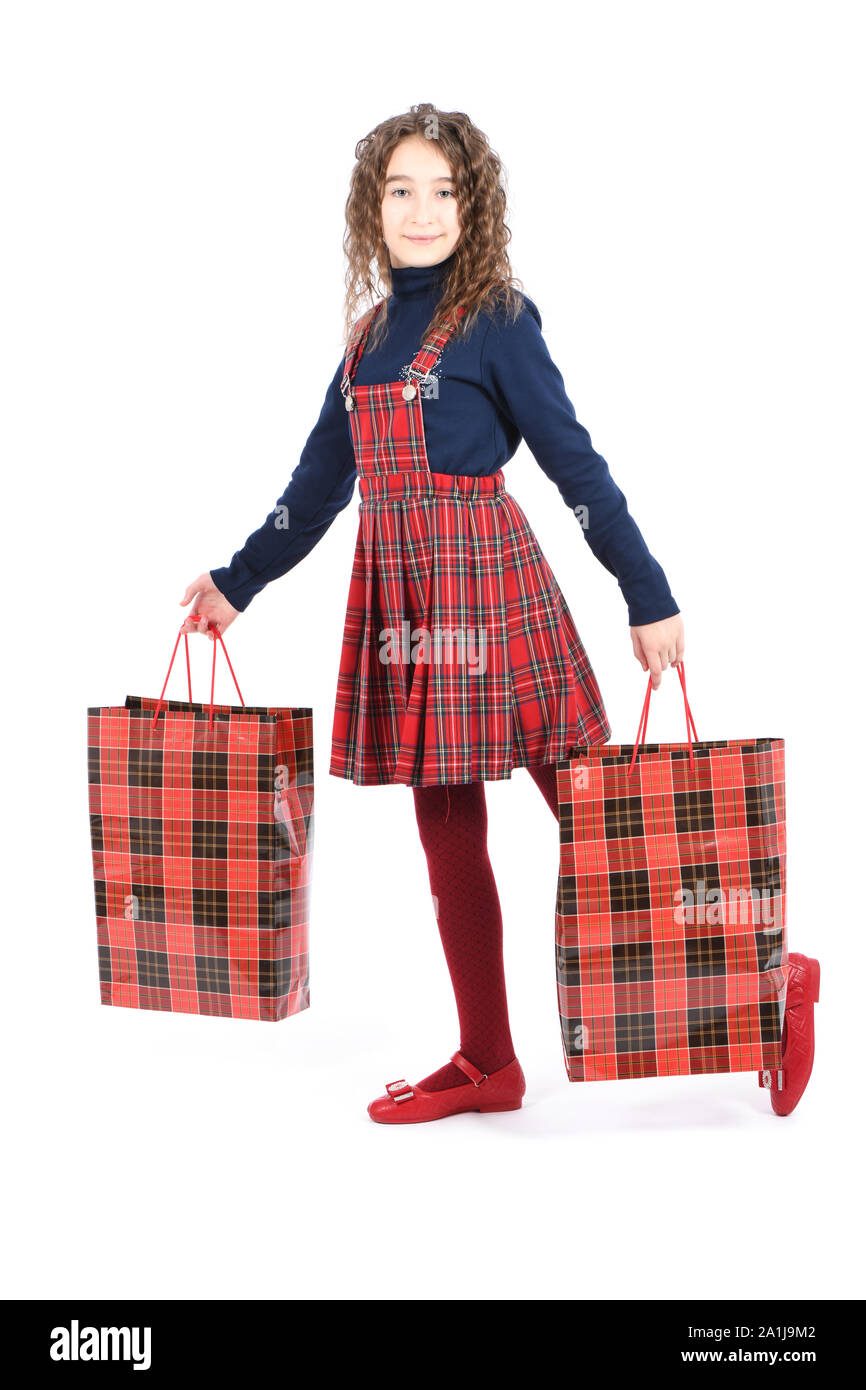 Child with a red packet isolated on white background. Little beauty ...