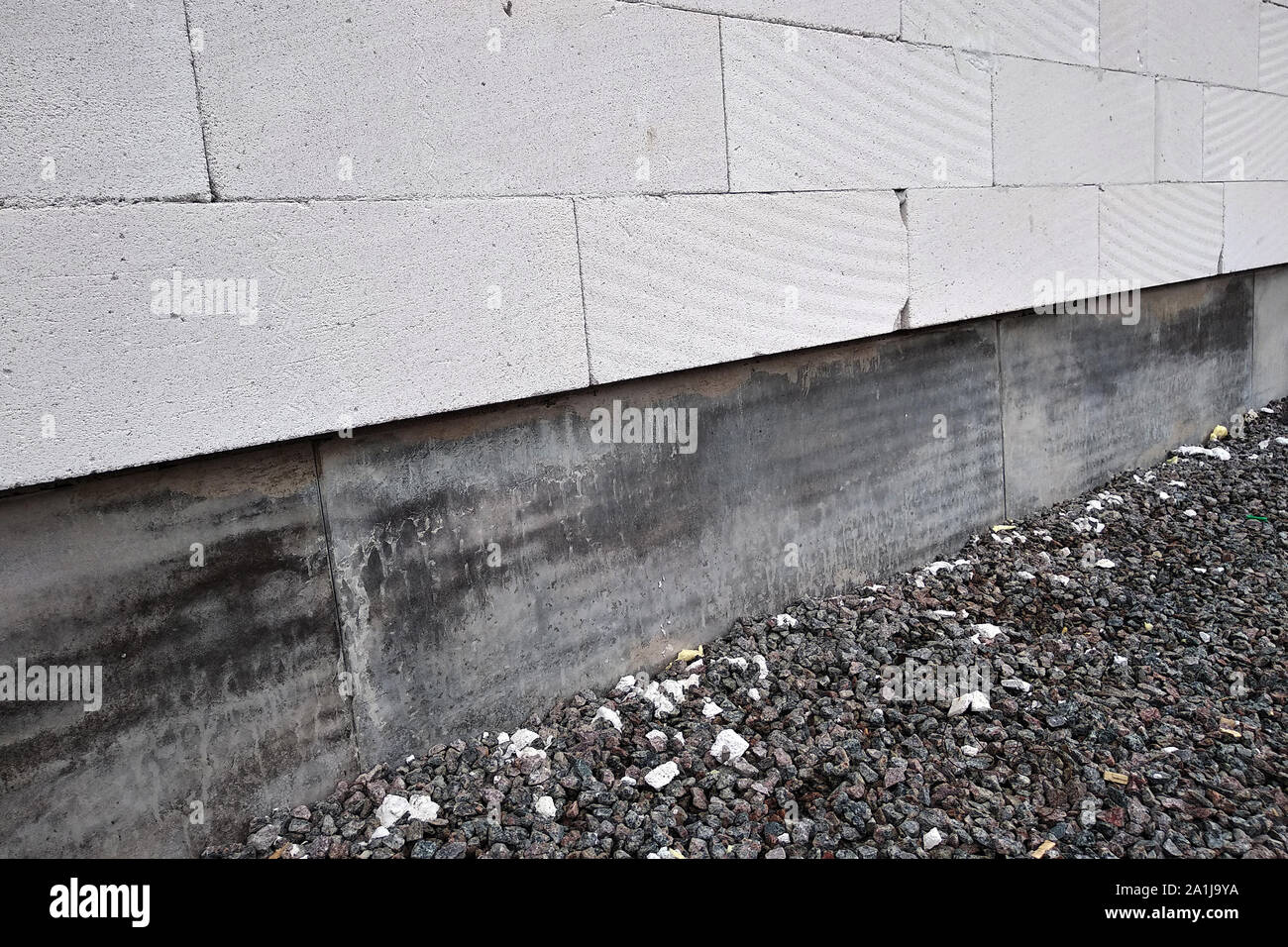 Facade of white block building under construction works Stock Photo - Alamy
