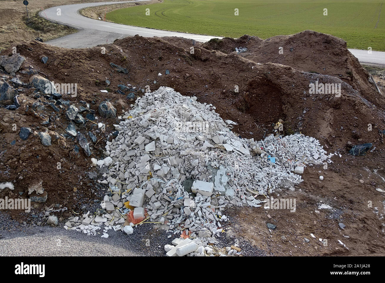 Pile of broken garbage plaster at construction site Stock Photo - Alamy