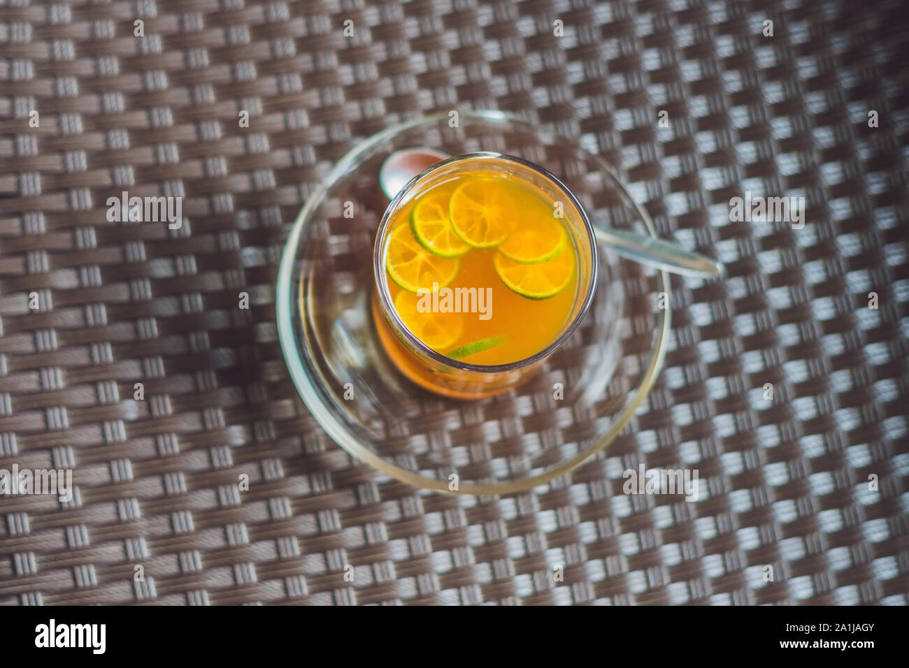 Tangerine tea on a table in a cafe Stock Photo - Alamy