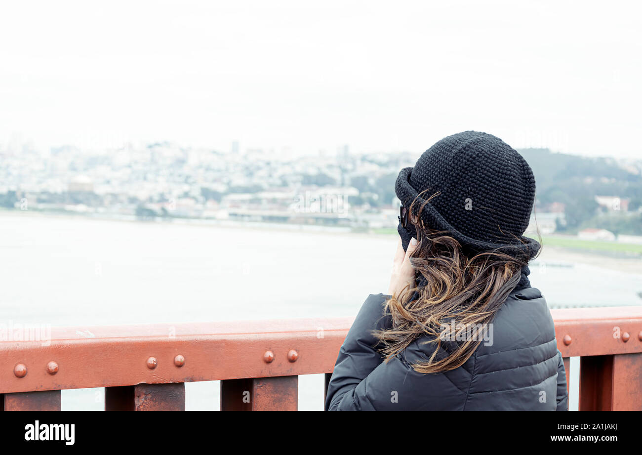 Rear view woman bridge city hi-res stock photography and images - Alamy