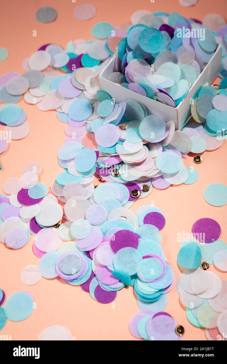 Festive background with color paper confetti Stock Photo - Alamy
