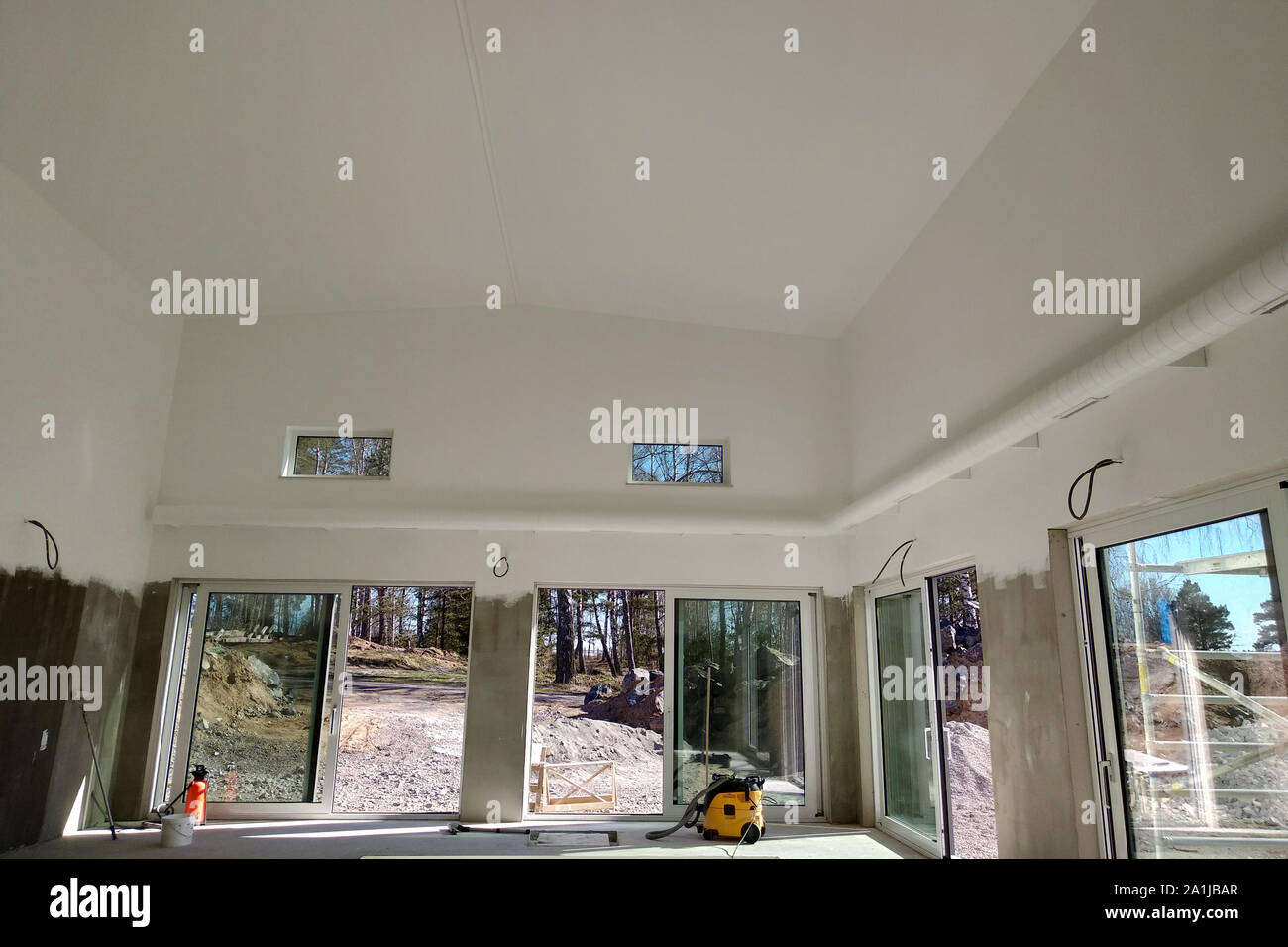 Interior of a house with big room under renovation works Stock Photo ...