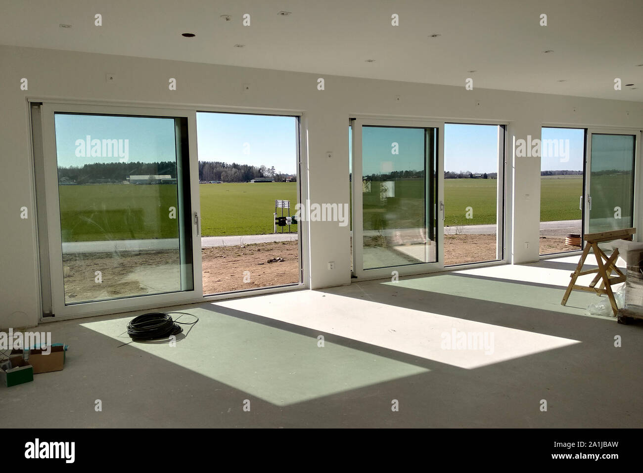 Interior of a house with big room under renovation works Stock Photo ...