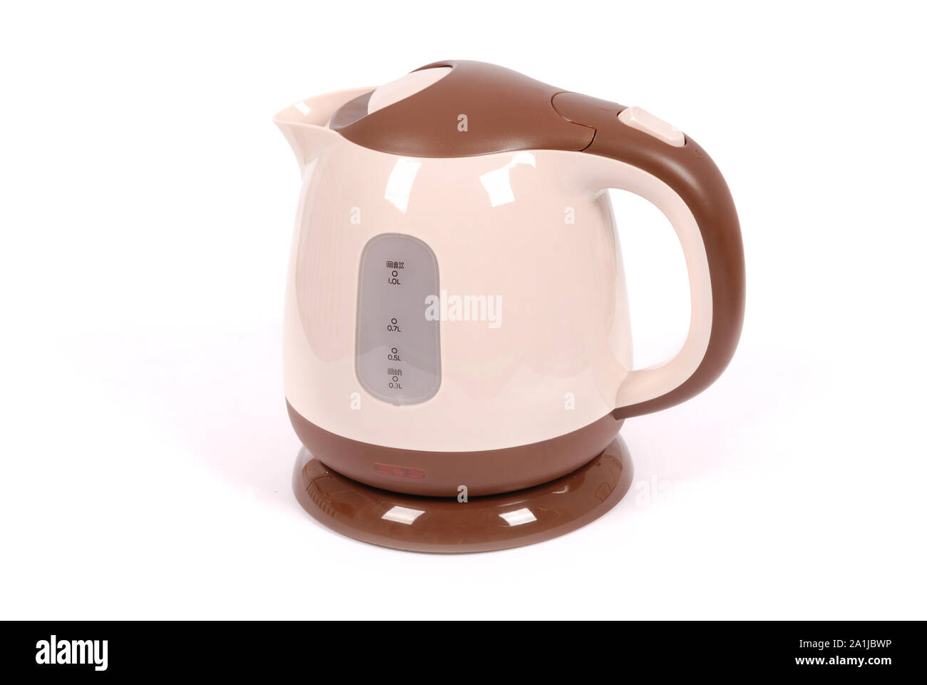 Electric kettle, isolated on white. Stylish modern beige and brown ...