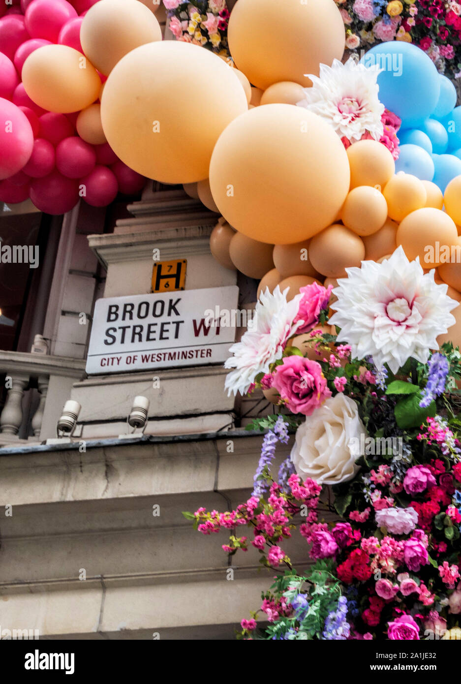 Colourful balloons and silk flowers hi-res stock photography and images ...