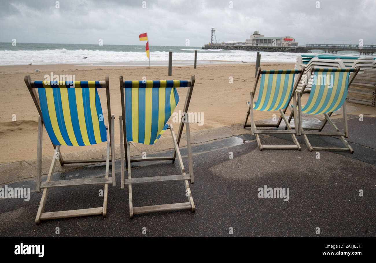 Empty deckchairs set up on a deserted Bournemouth beach in Dorset Stock ...