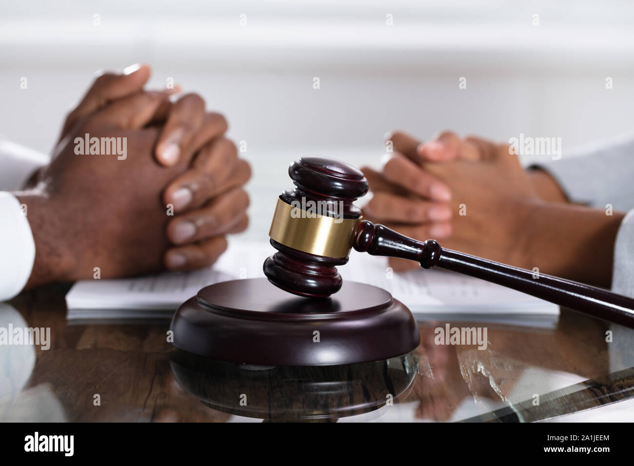 Divorce Concept With Gavel And Wife And Husband Hands On Desk Stock ...