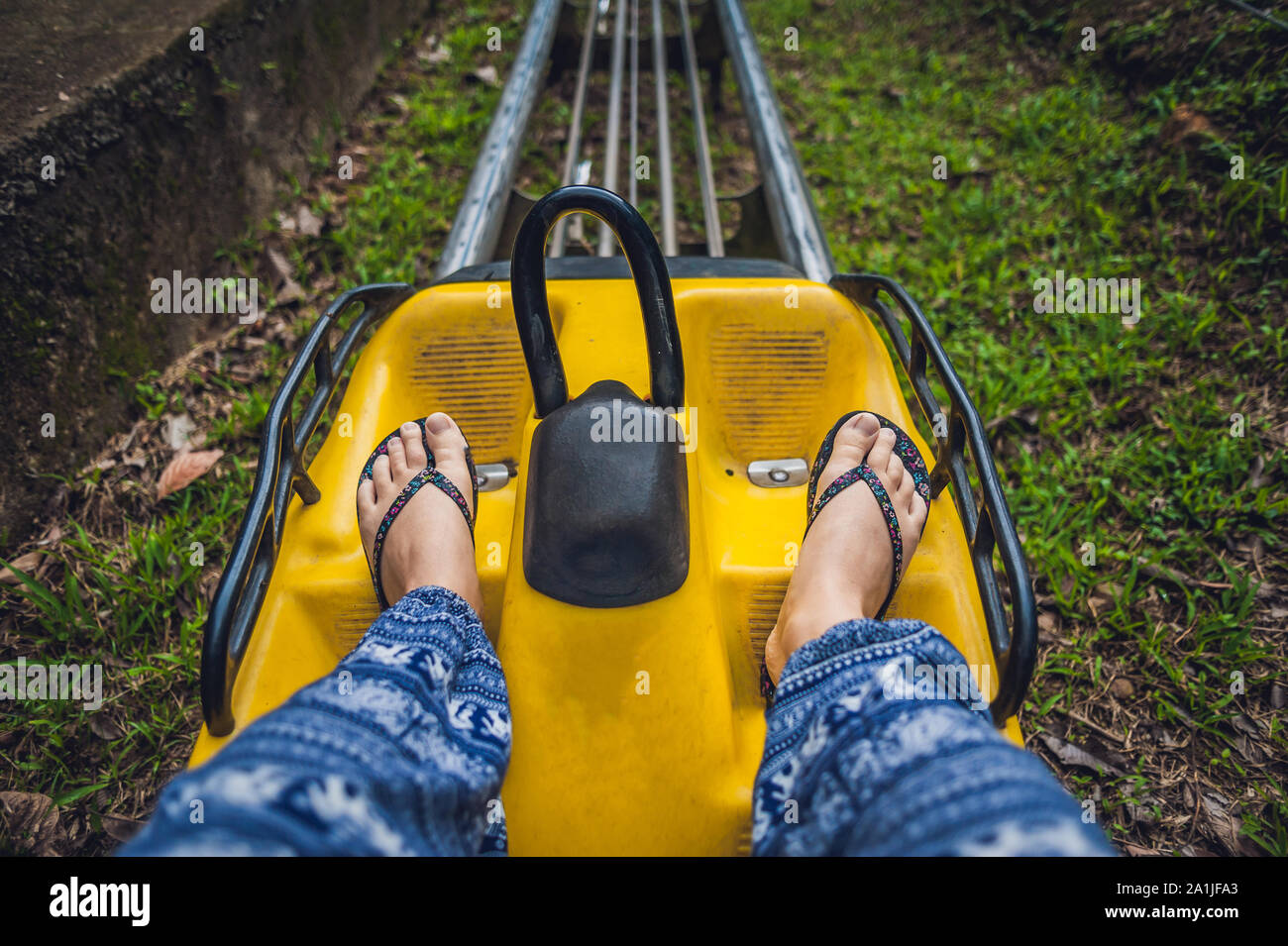 Woman on roller coaster hi-res stock photography and images - Alamy