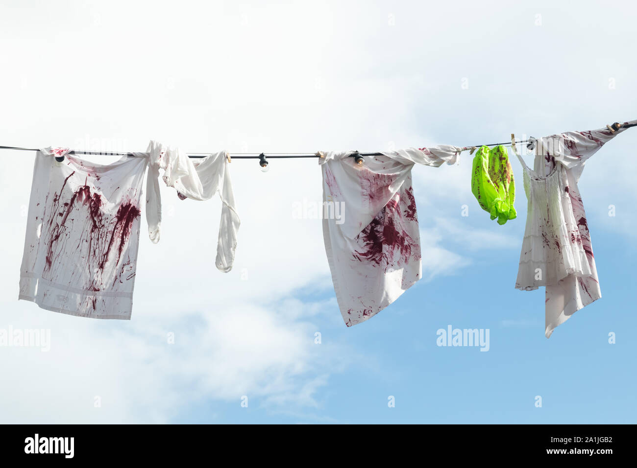 Bloody clothes hi-res stock photography and images - Alamy