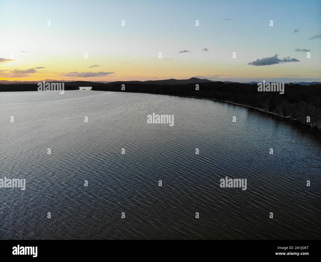 Sunset in the horizon Stock Photo - Alamy