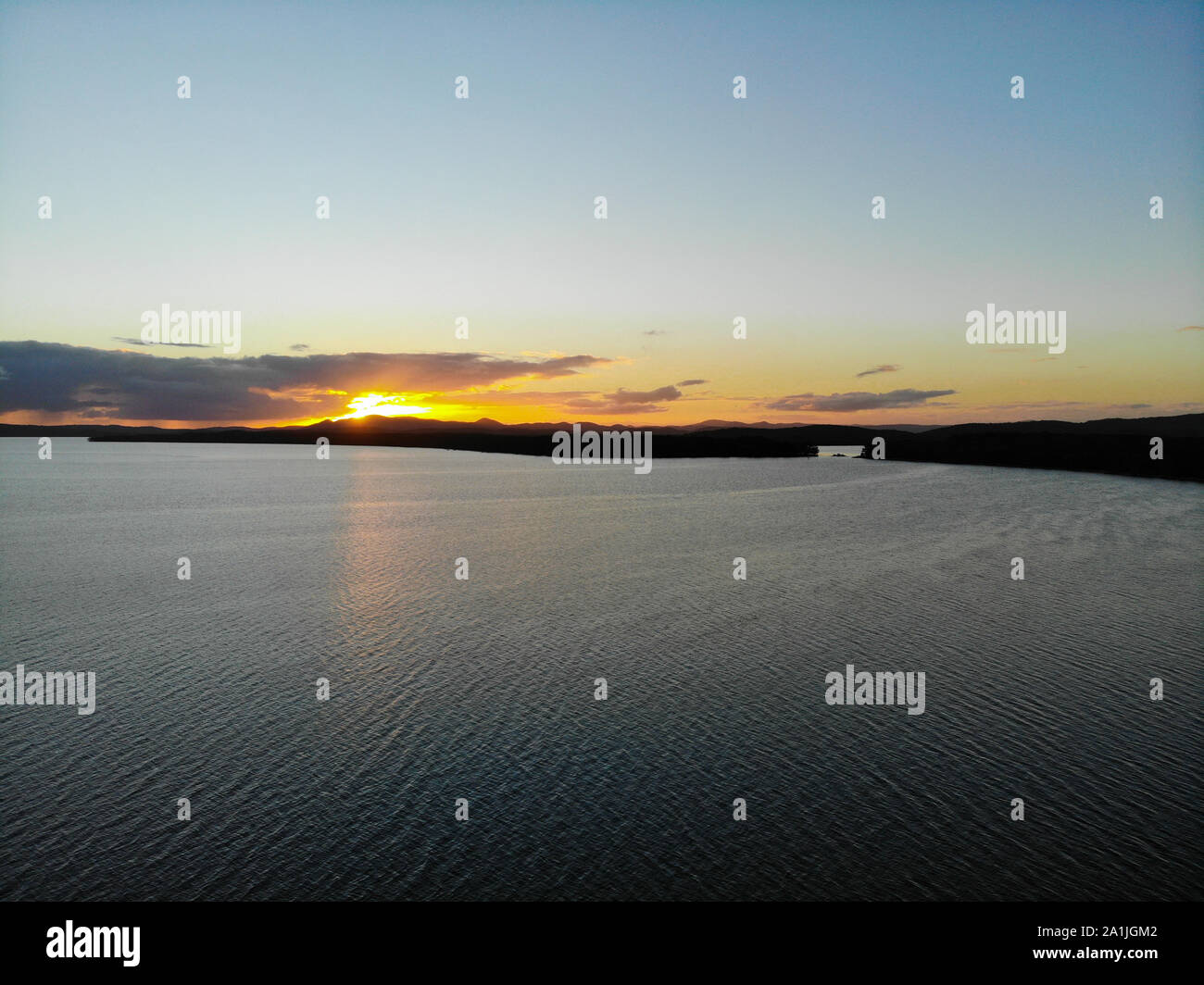 Sunset in the horizon Stock Photo - Alamy
