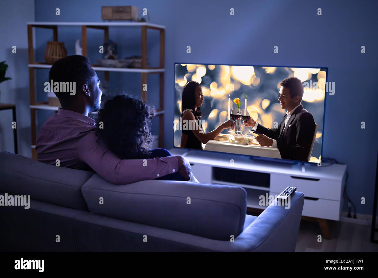 Family Watching Tv At Night